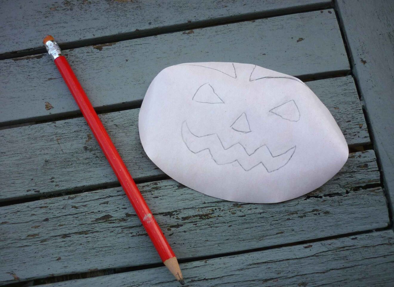 Make your own pumpkin face motif top in minutes using an iron on patch ...